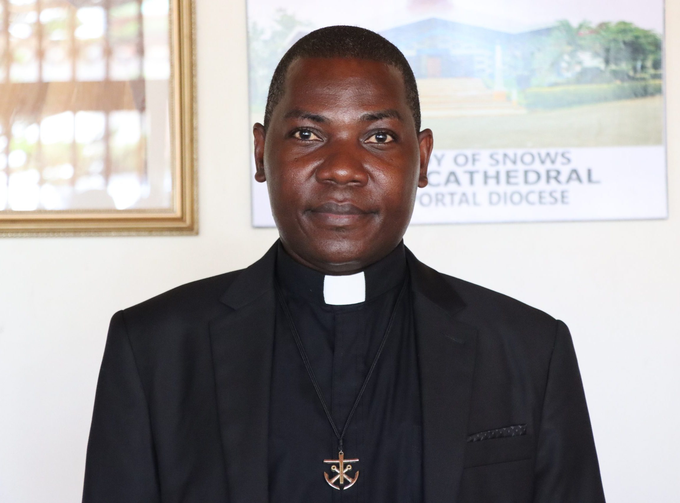 Rev. Fr. Peter Caxton Mayanja, C.S.C - Holy Cross Lake View S.S.S Wanyange
